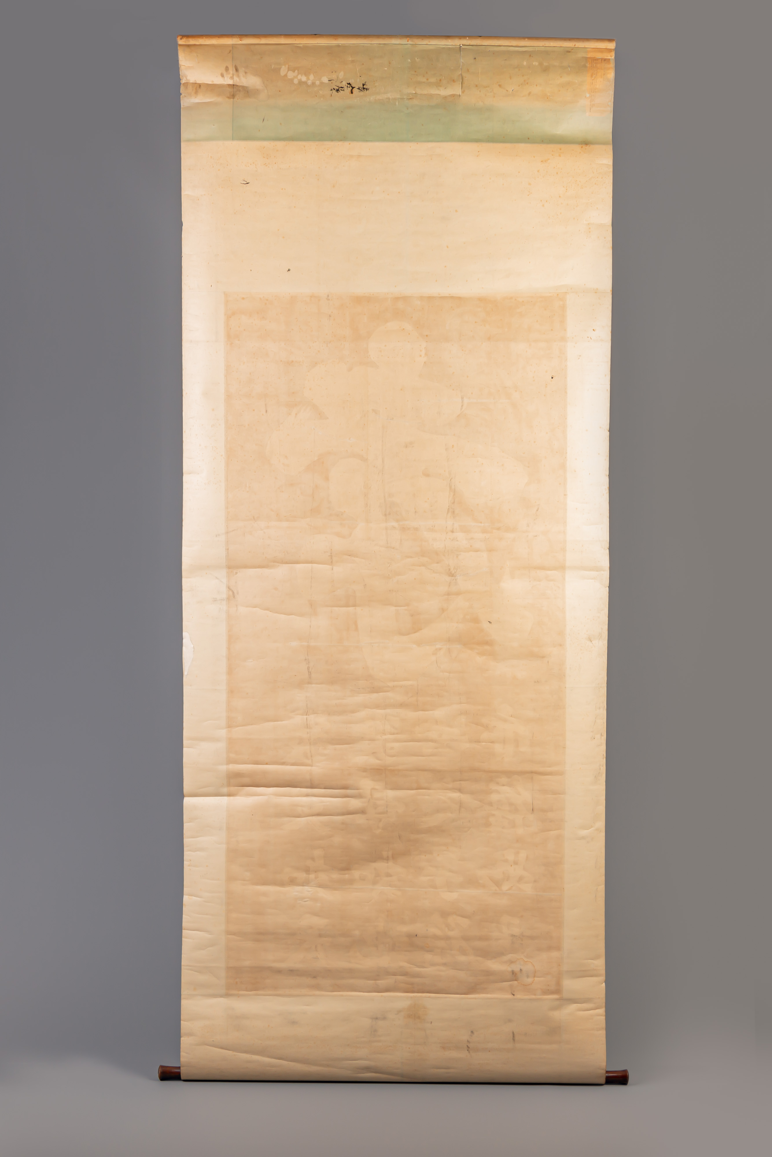 A Chinese black ground calligraphy paper scroll, Republic, first half ...