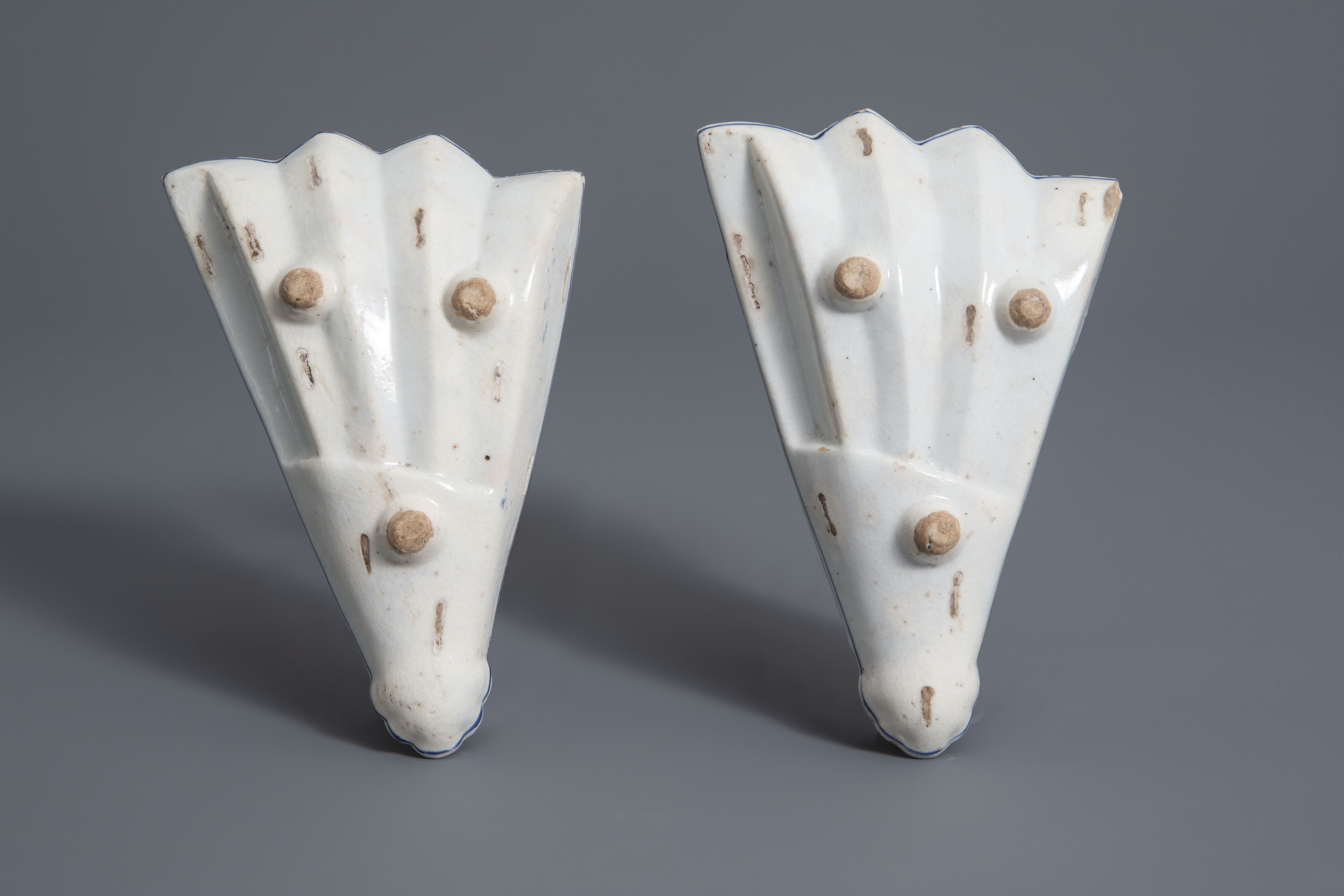 A pair of Japanese blue and white fan-shaped mukozuke dishes, Edo, 17th ...