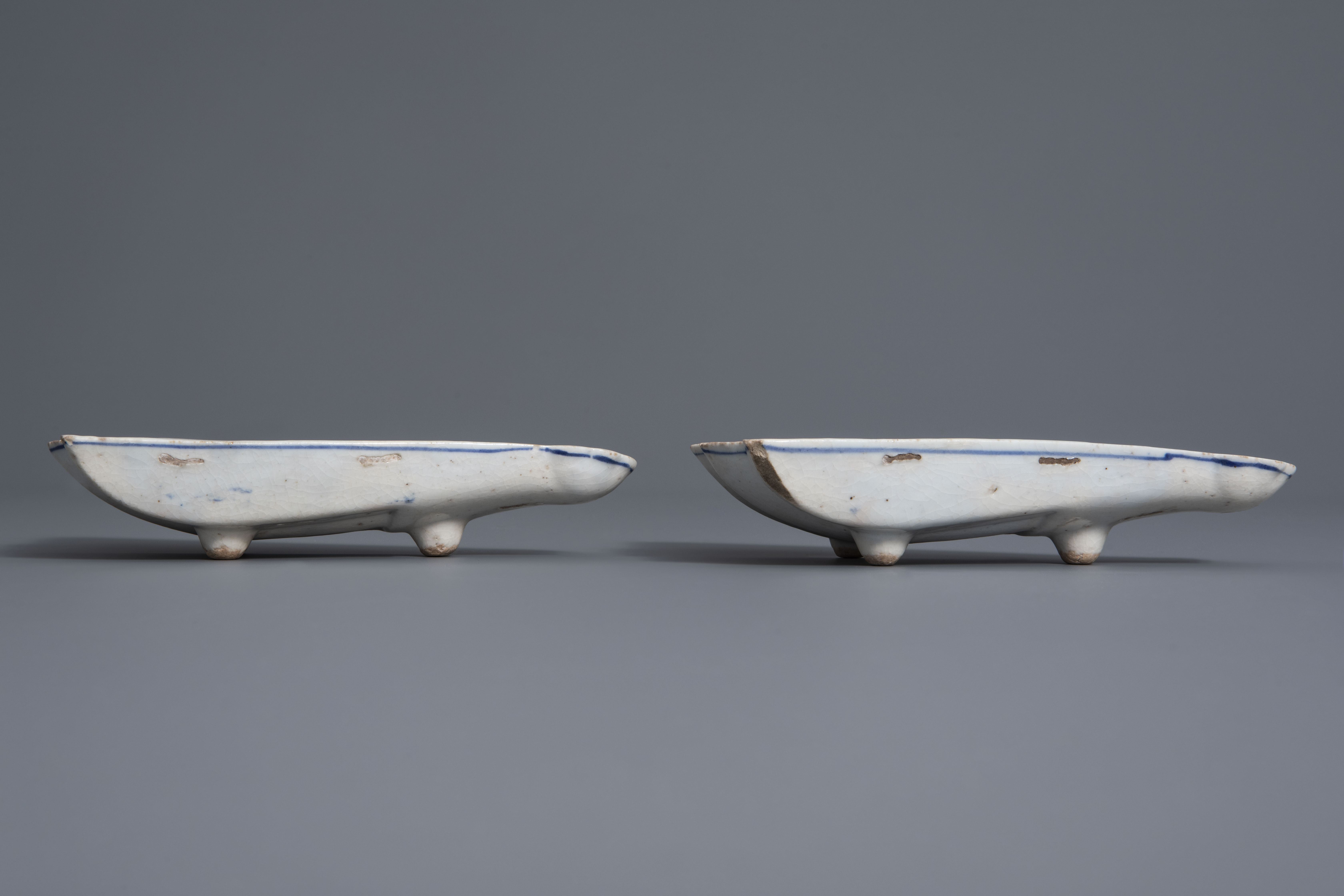 A pair of Japanese blue and white fan-shaped mukozuke dishes, Edo, 17th ...