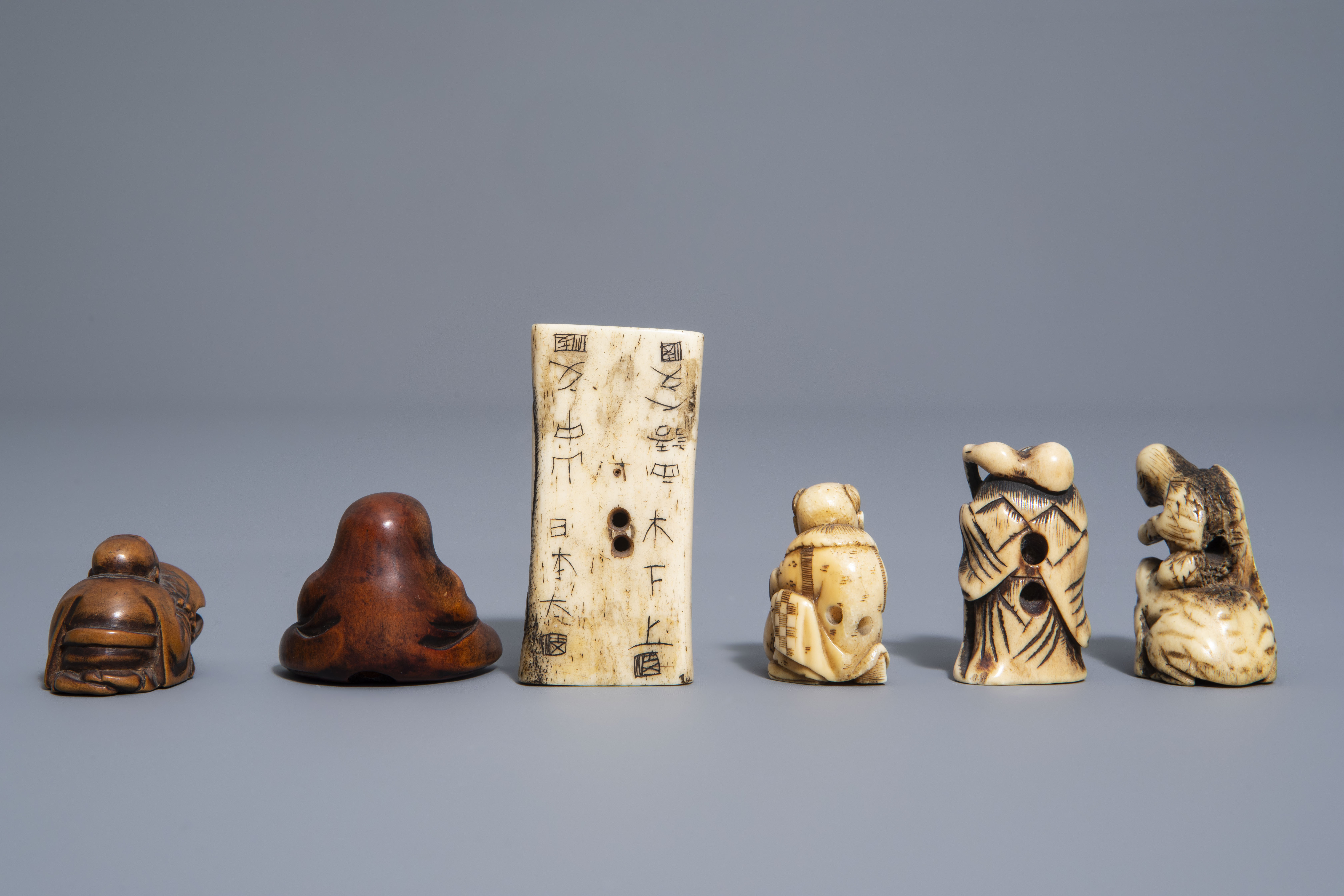 Six Japanese bone and boxwood netsuke with different designs, 19th/20th ...