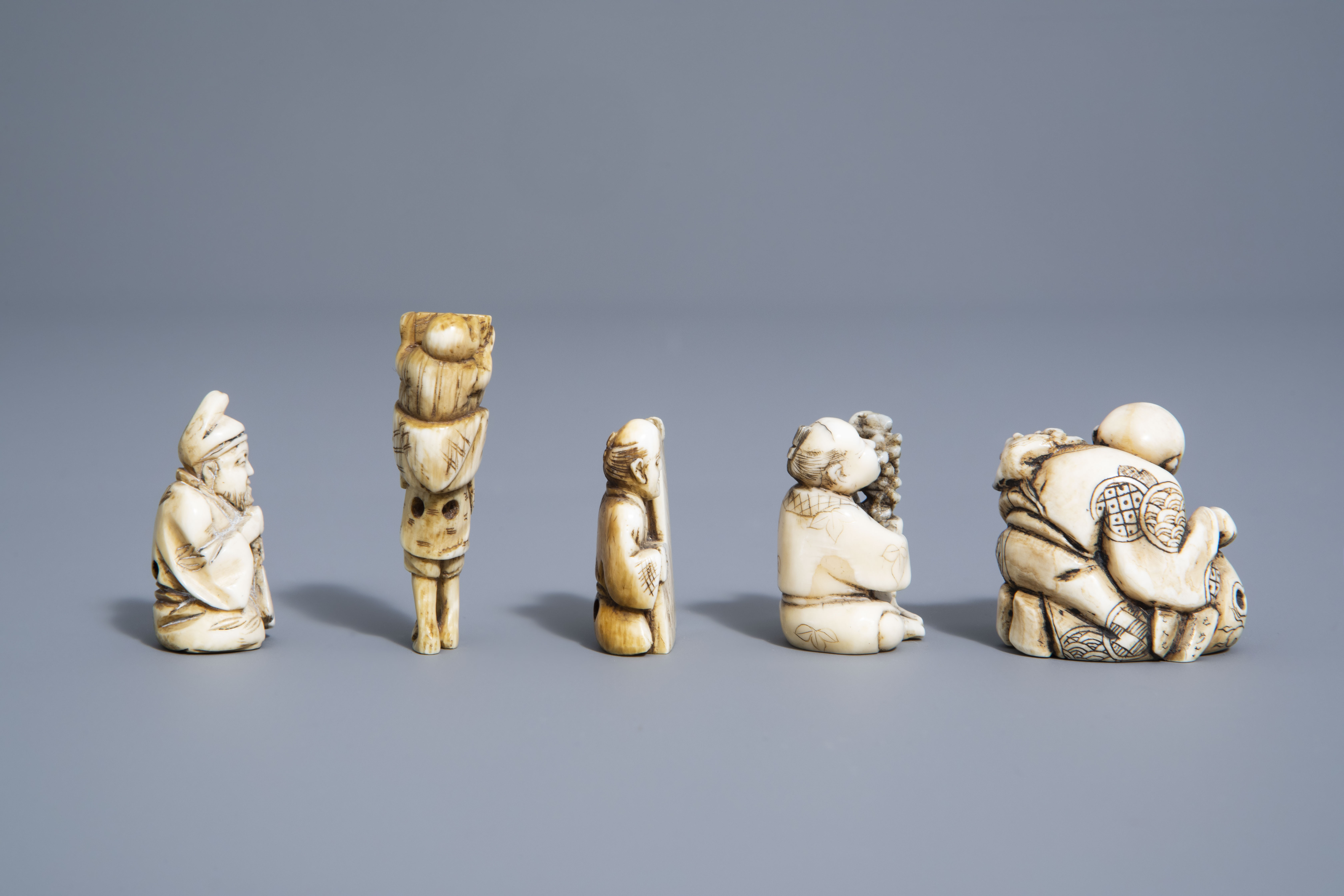 Five Japanese ivory netsuke with scenes from daily life, 19th/20th C ...