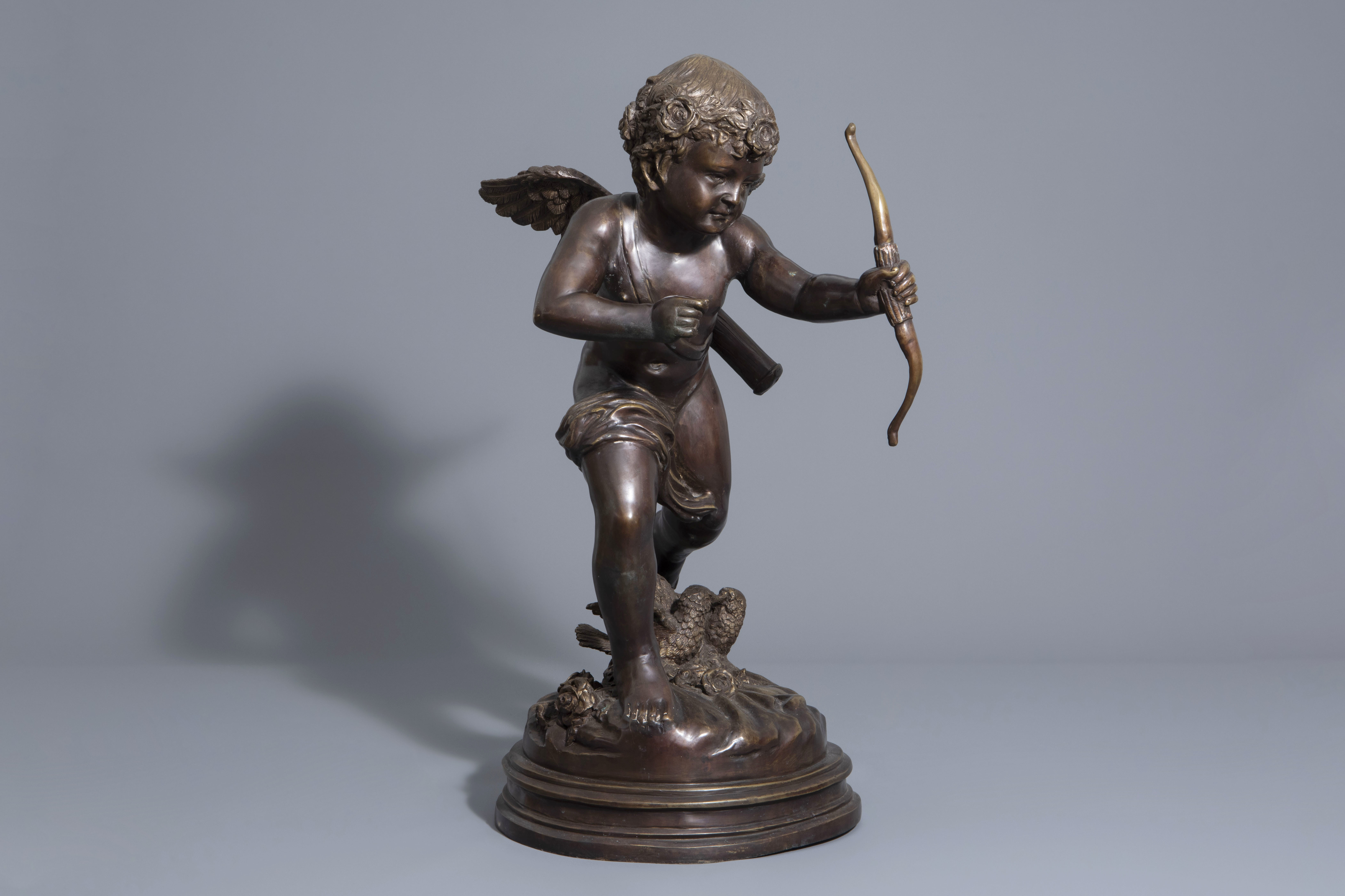 In the manner of Joseph d'Aste (1881-1945): Cupid, patinated bronze ...
