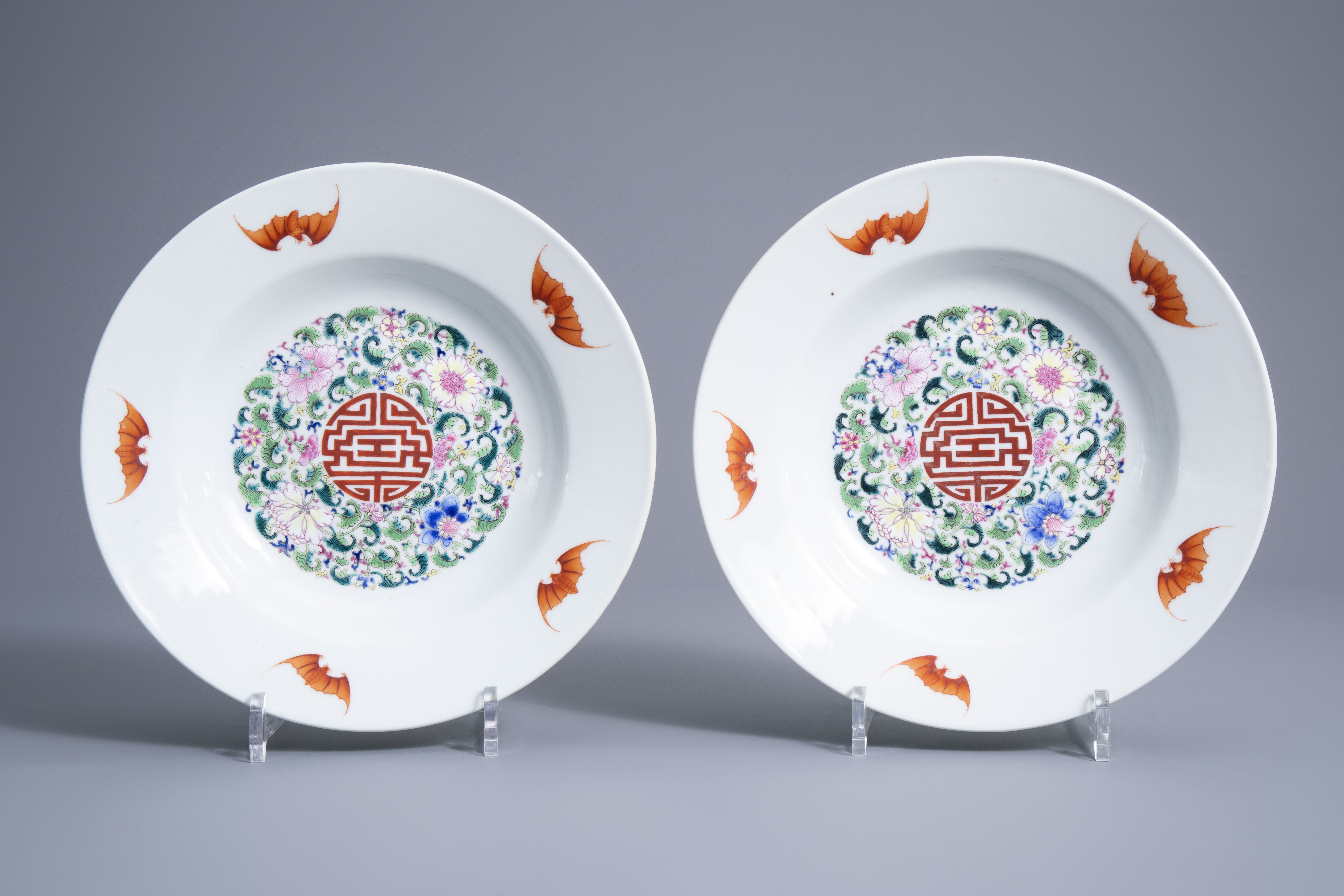 A pair of Chinese famille rose 'bats and shou' dishes with lime green ...