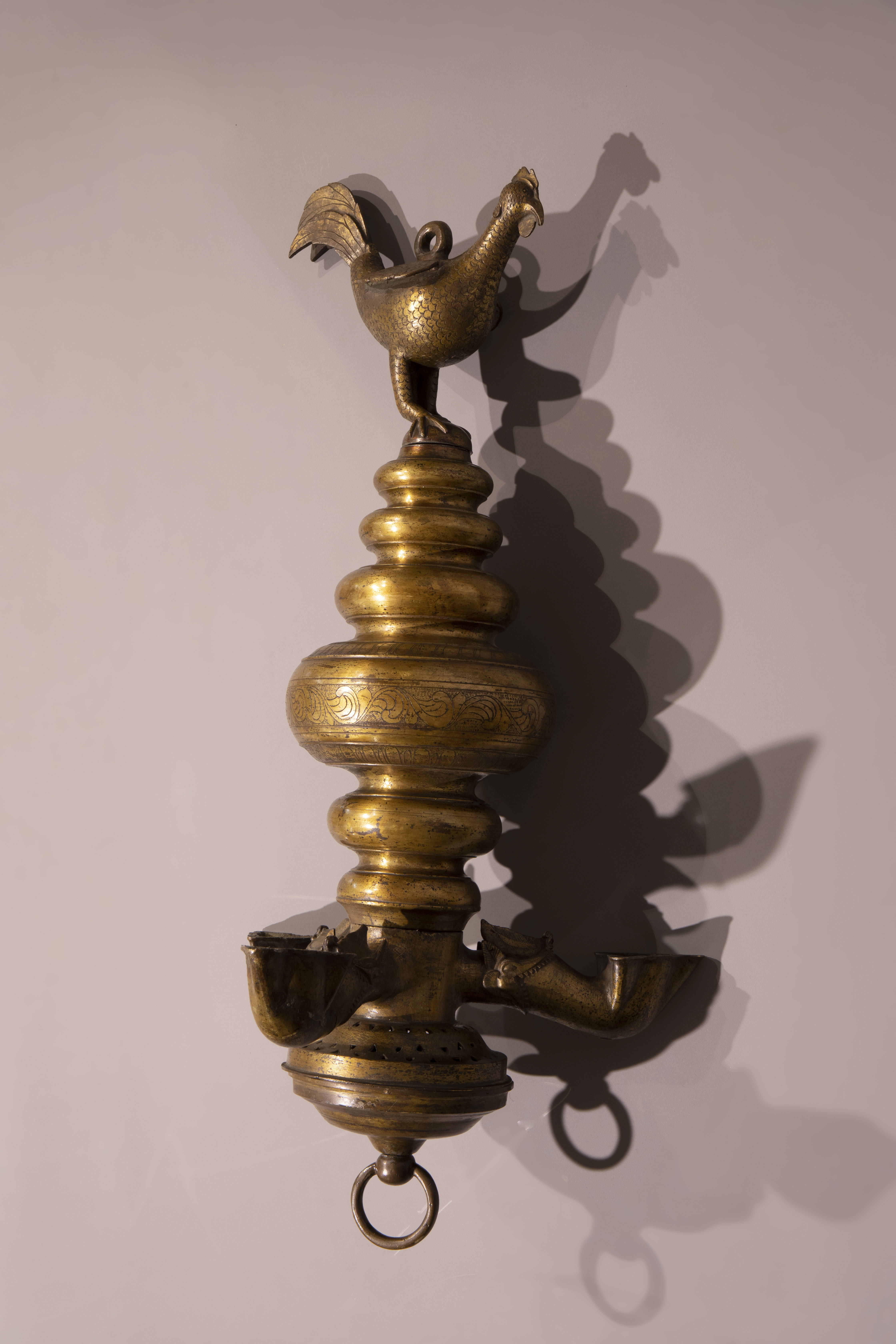 A bronze Pahan oil lamp with engraved floral design, Sri Lanka, 19th ...