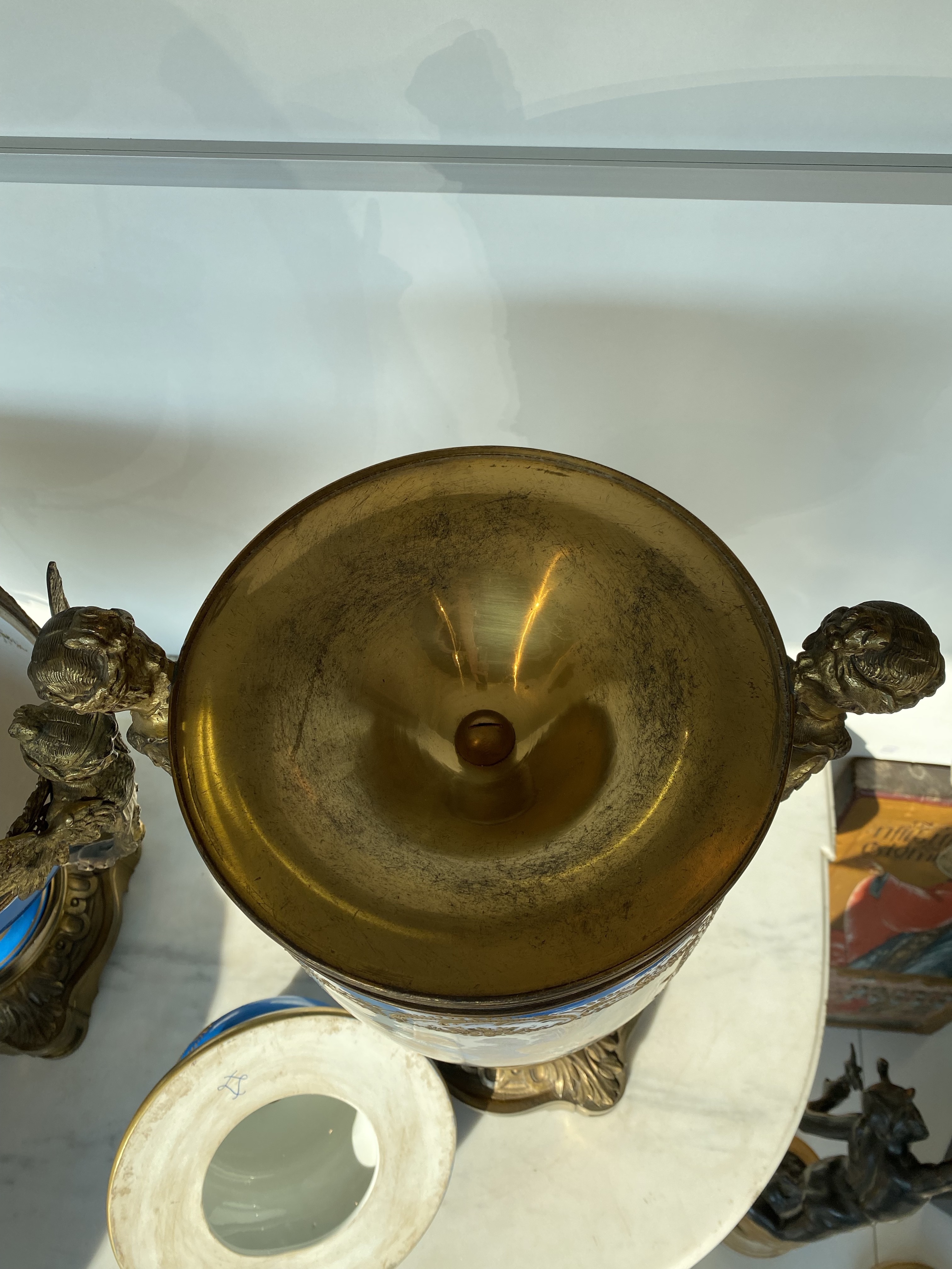 A French gilt bronze mounted 'bleu celeste' ground three-piece ...