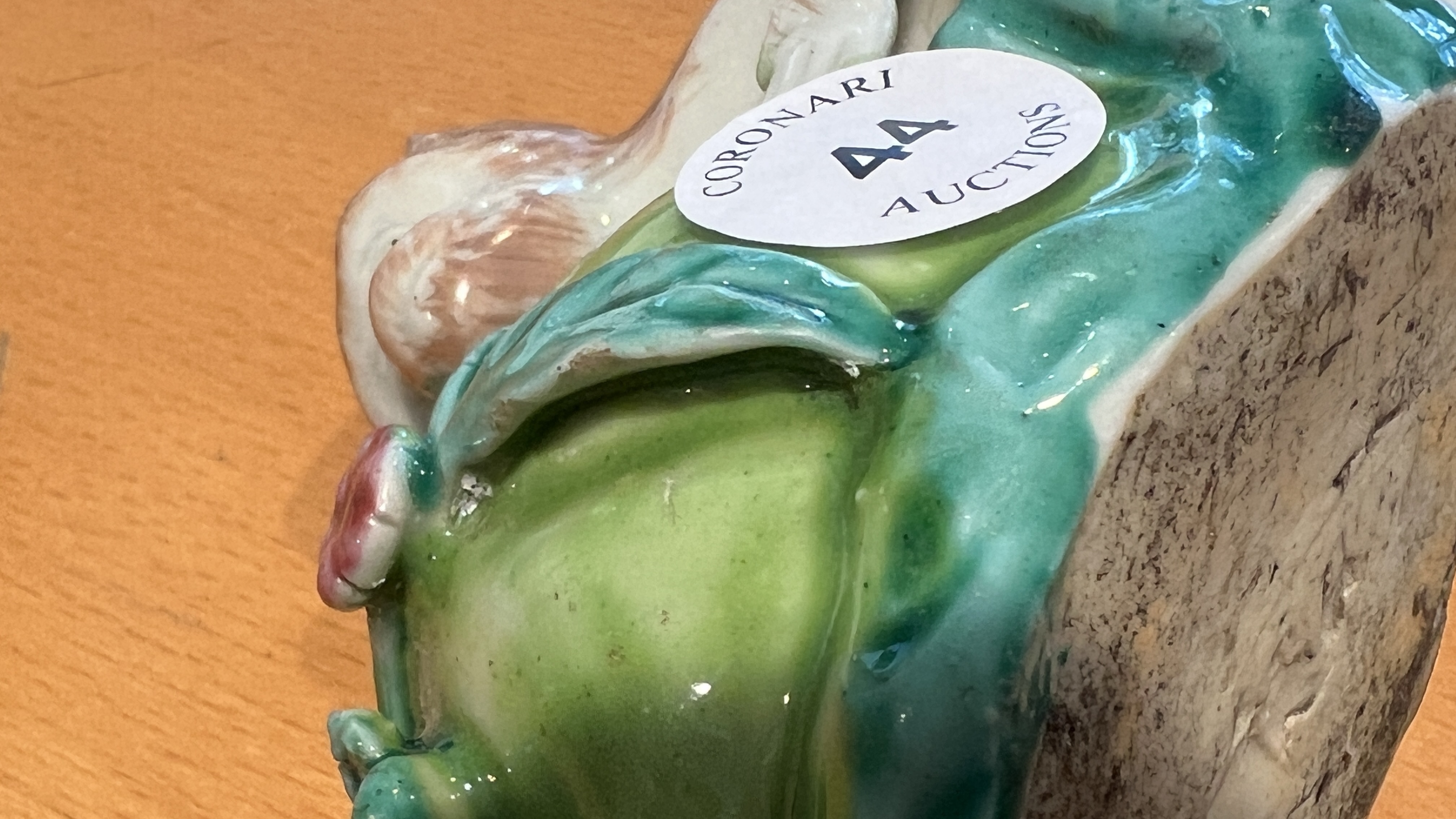 A Chinese famille rose water dropper in the shape of a monkey and a ...