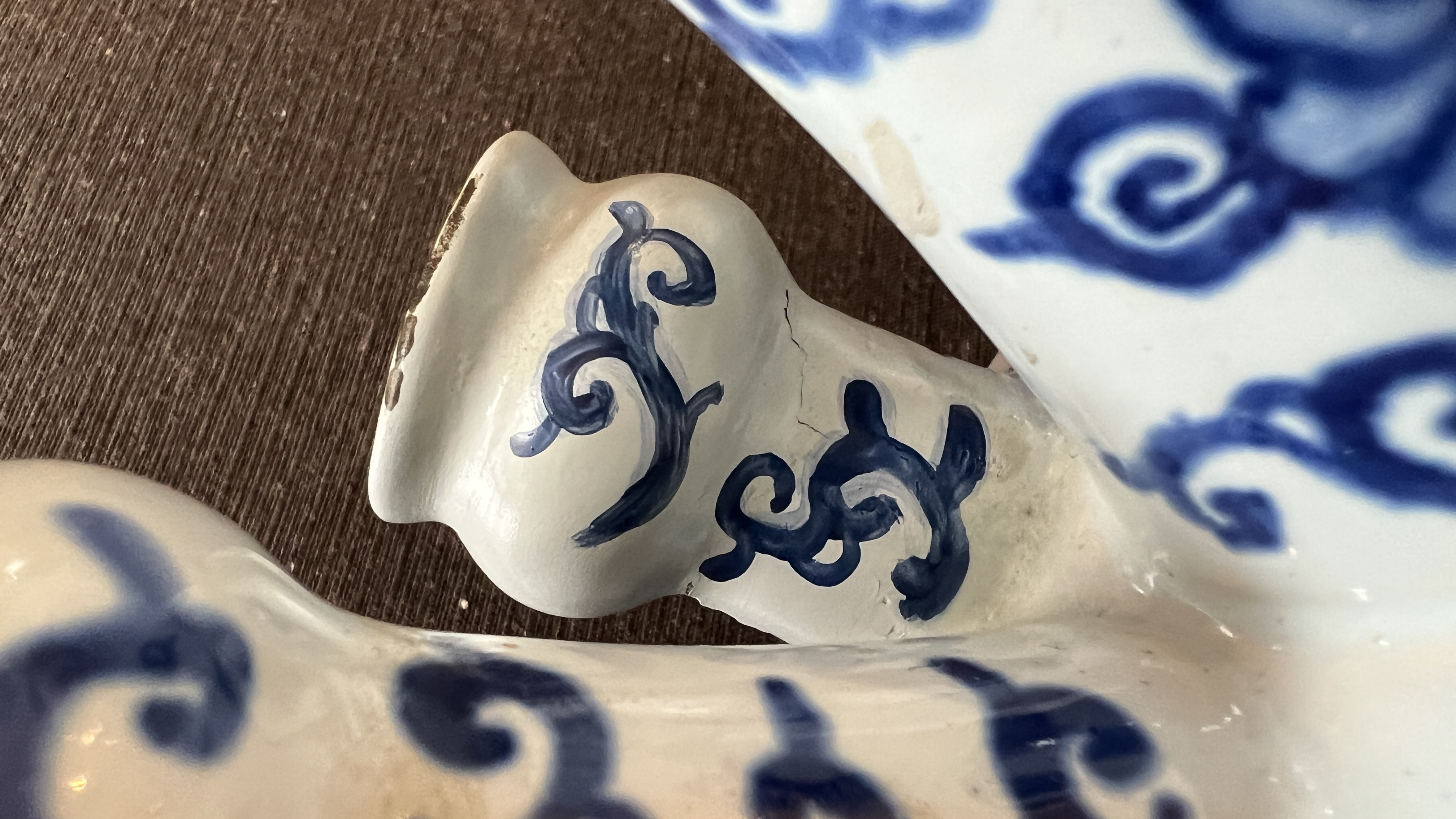 A heart-shaped Dutch Delft blue and white tulip vase with 'winged ...