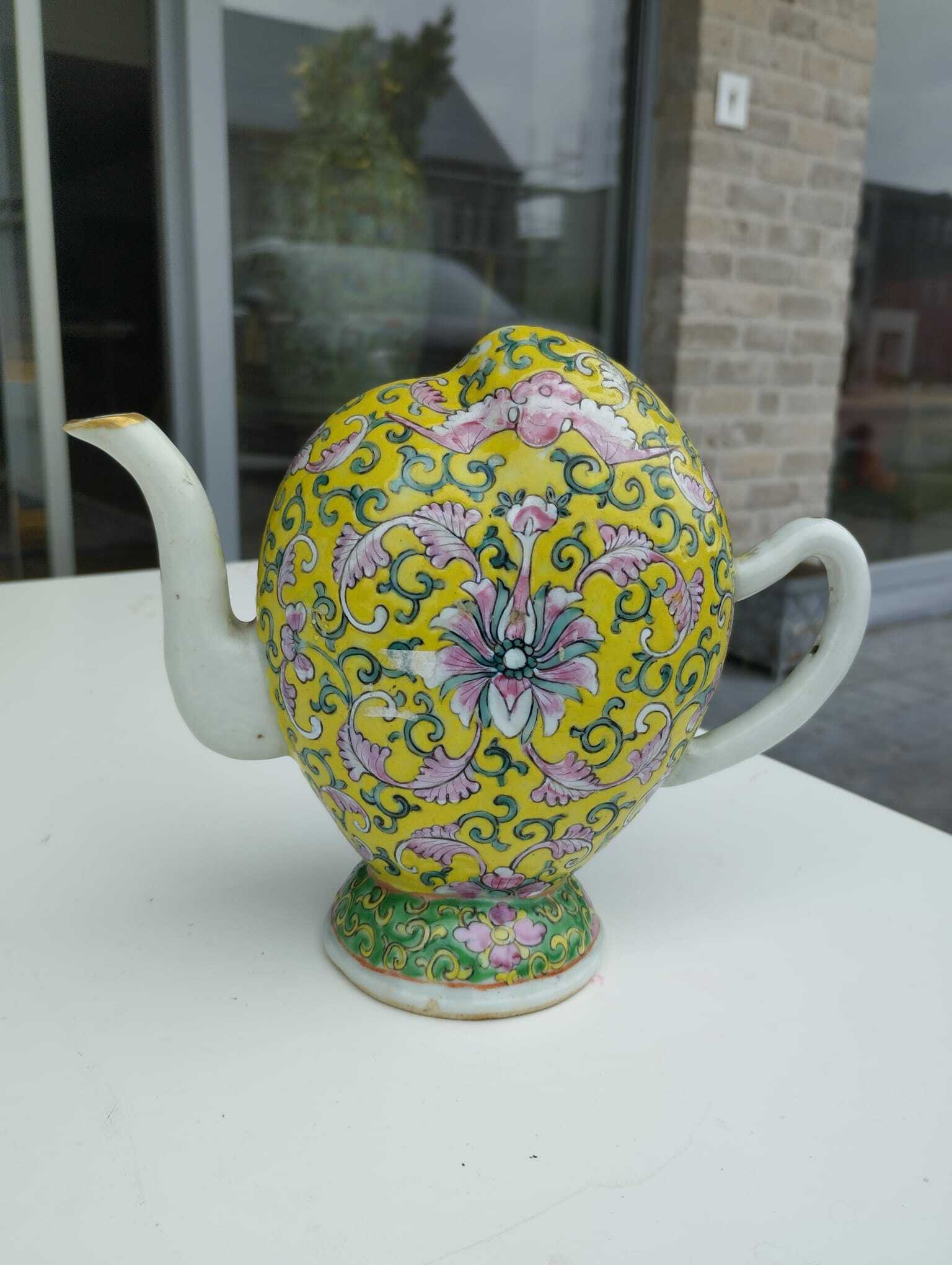 Three Chinese famille rose peach-shaped cadogan teapots with floral ...
