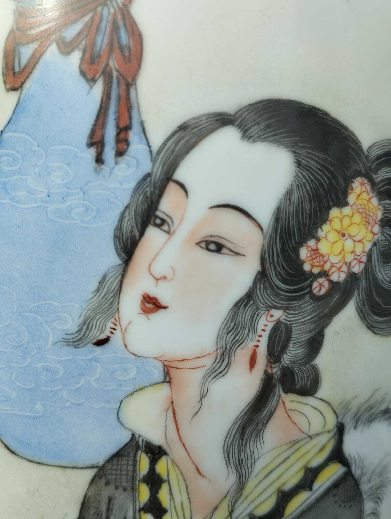 A Chinese famille rose vase with a lady and two parrots, signed Qing ...