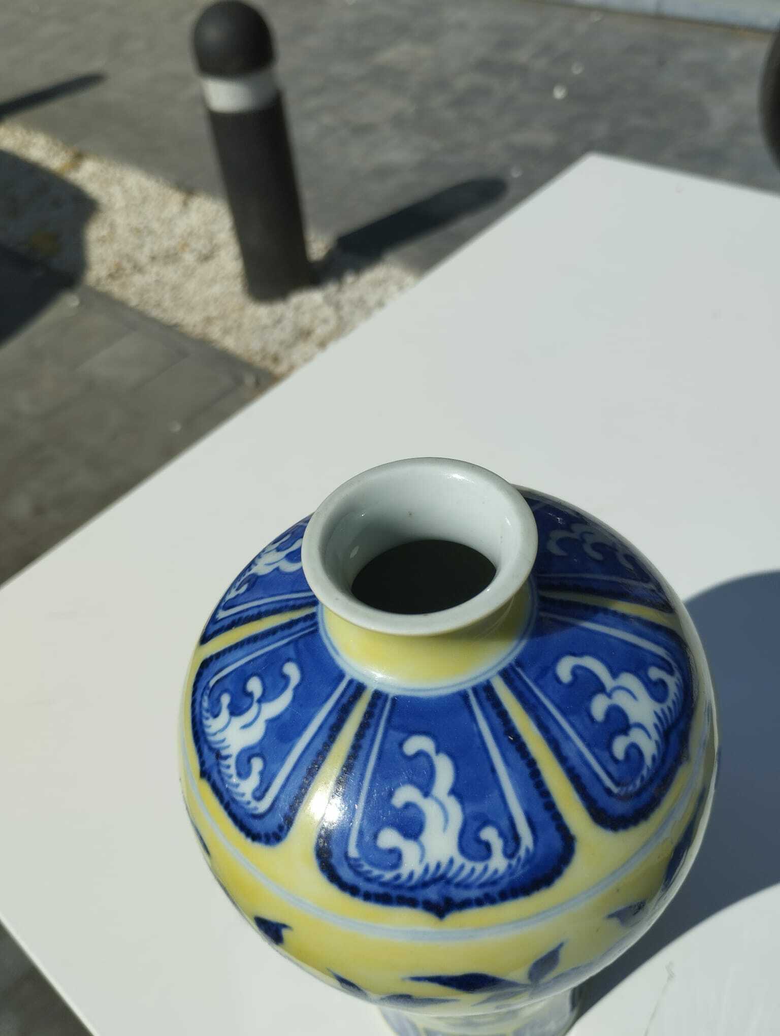 A Chinese blue and white yellow-ground meiping vase with sanduo design ...