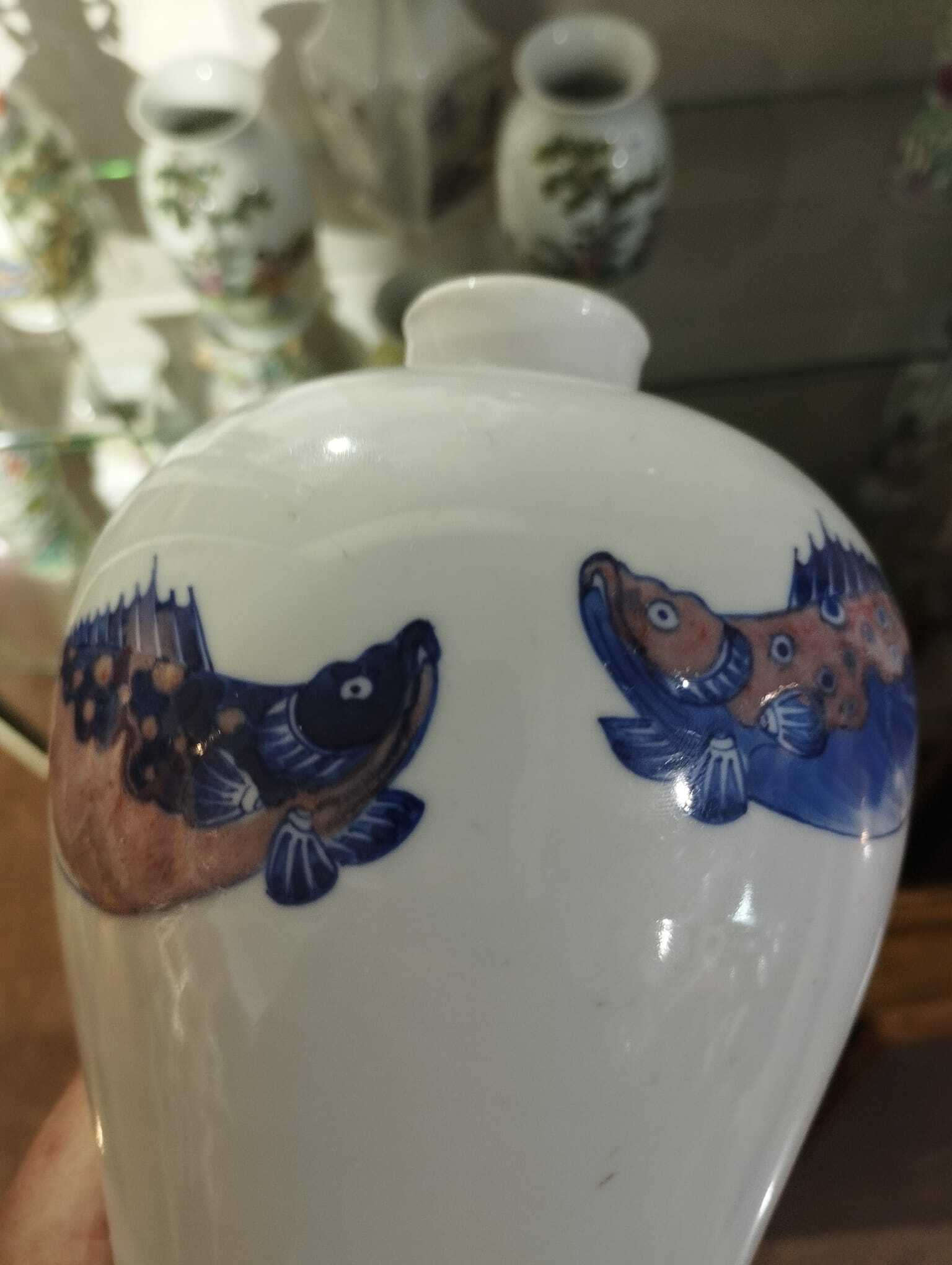 A Chinese blue, white and copper-red 'mandarin fish' meiping vase, 20th ...