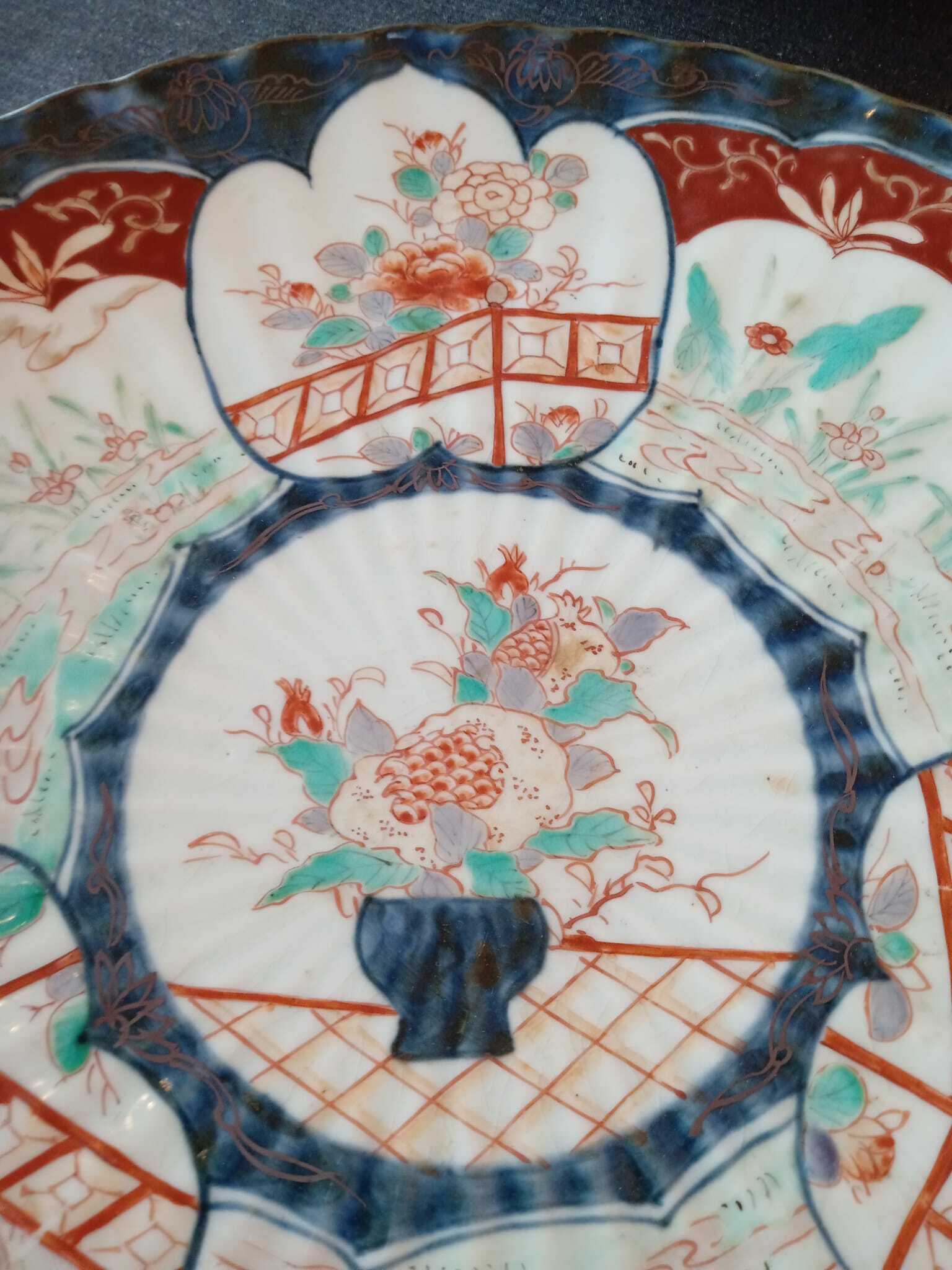 Three Japanese Imari dishes with floral design, landscapes and sea ...