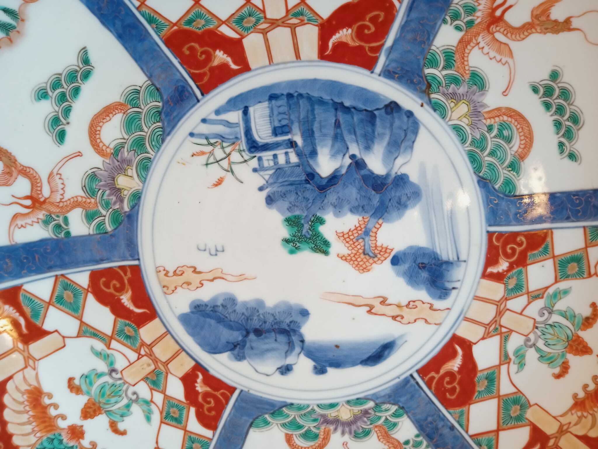 Three Japanese Imari dishes with floral design, landscapes and sea ...