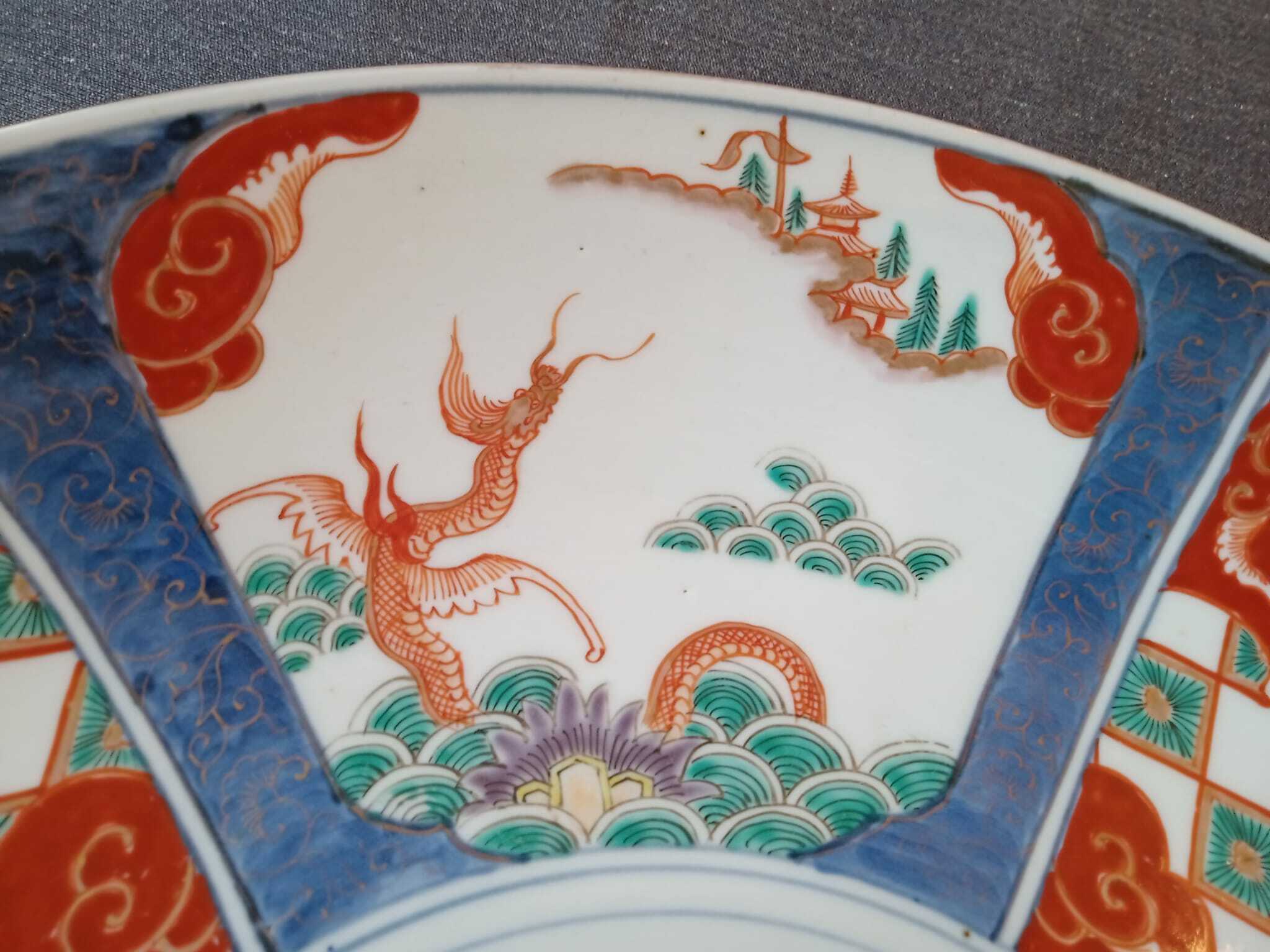 Three Japanese Imari dishes with floral design, landscapes and sea ...