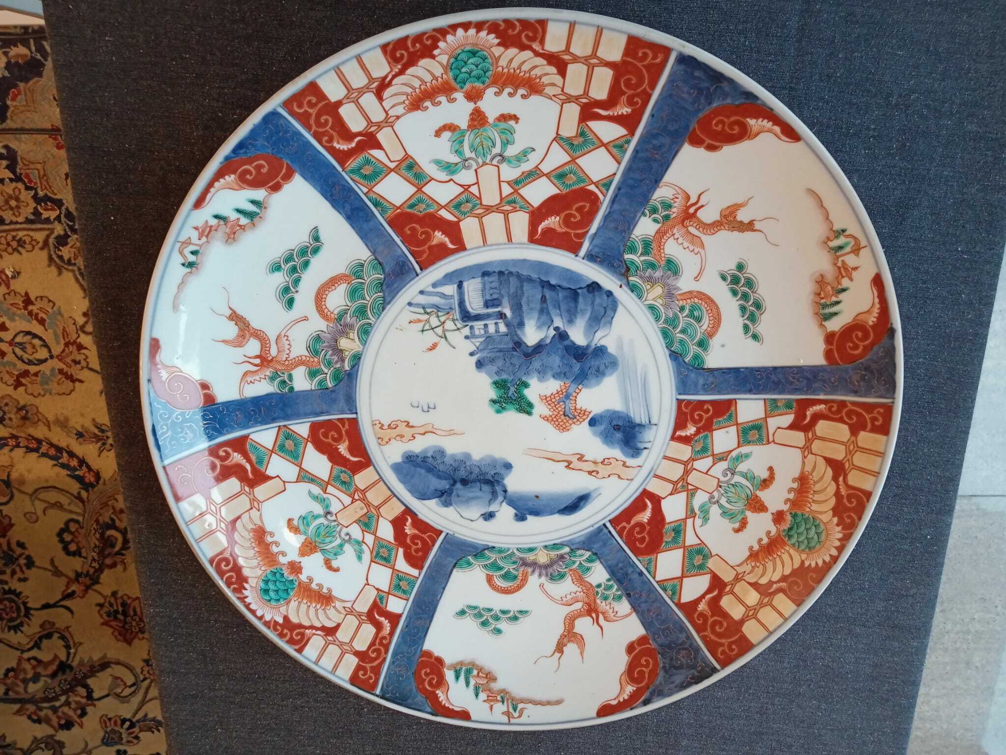 Three Japanese Imari dishes with floral design, landscapes and sea ...