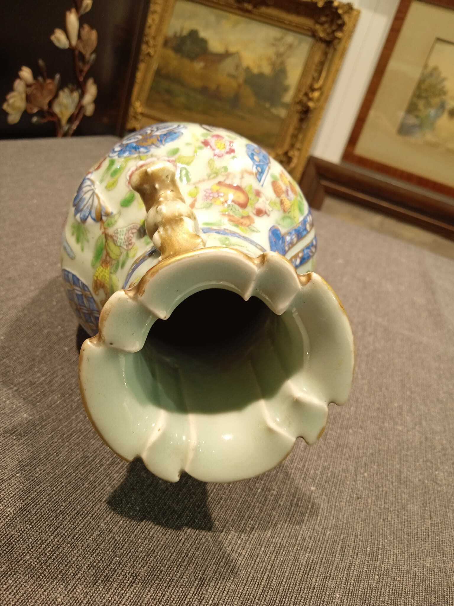 Two Chinese Canton famille rose cups and saucers with animated scenes ...