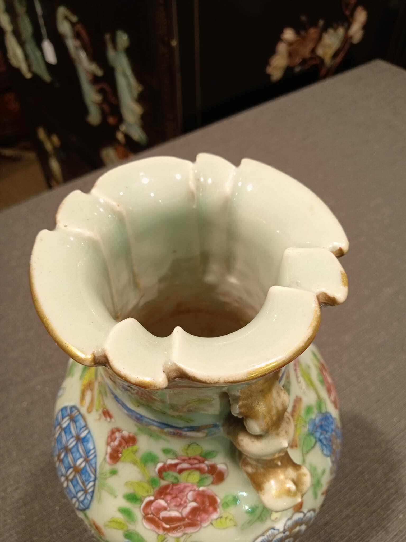 Two Chinese Canton famille rose cups and saucers with animated scenes ...