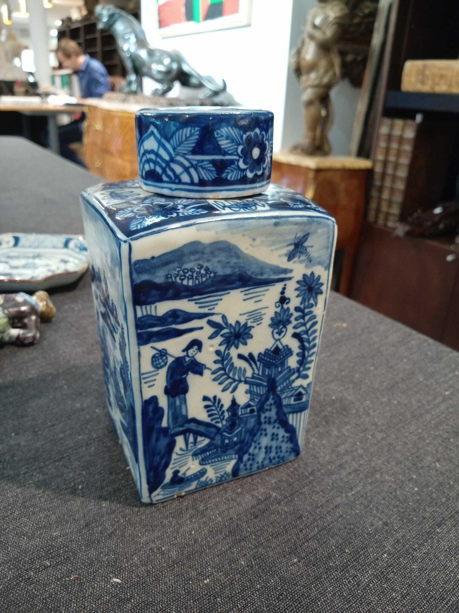 A varied collection of Dutch Delft blue and white items with figures in ...