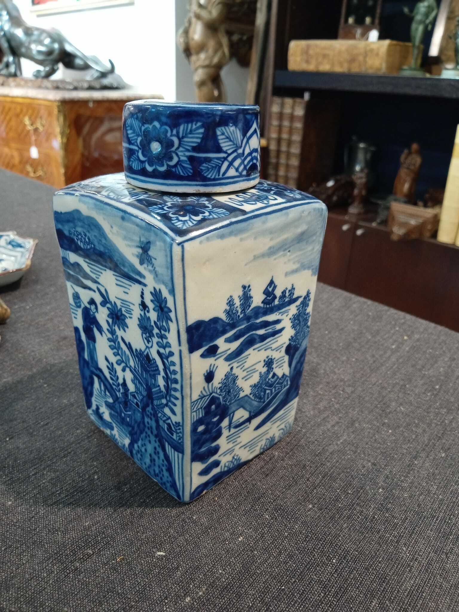 A varied collection of Dutch Delft blue and white items with figures in ...