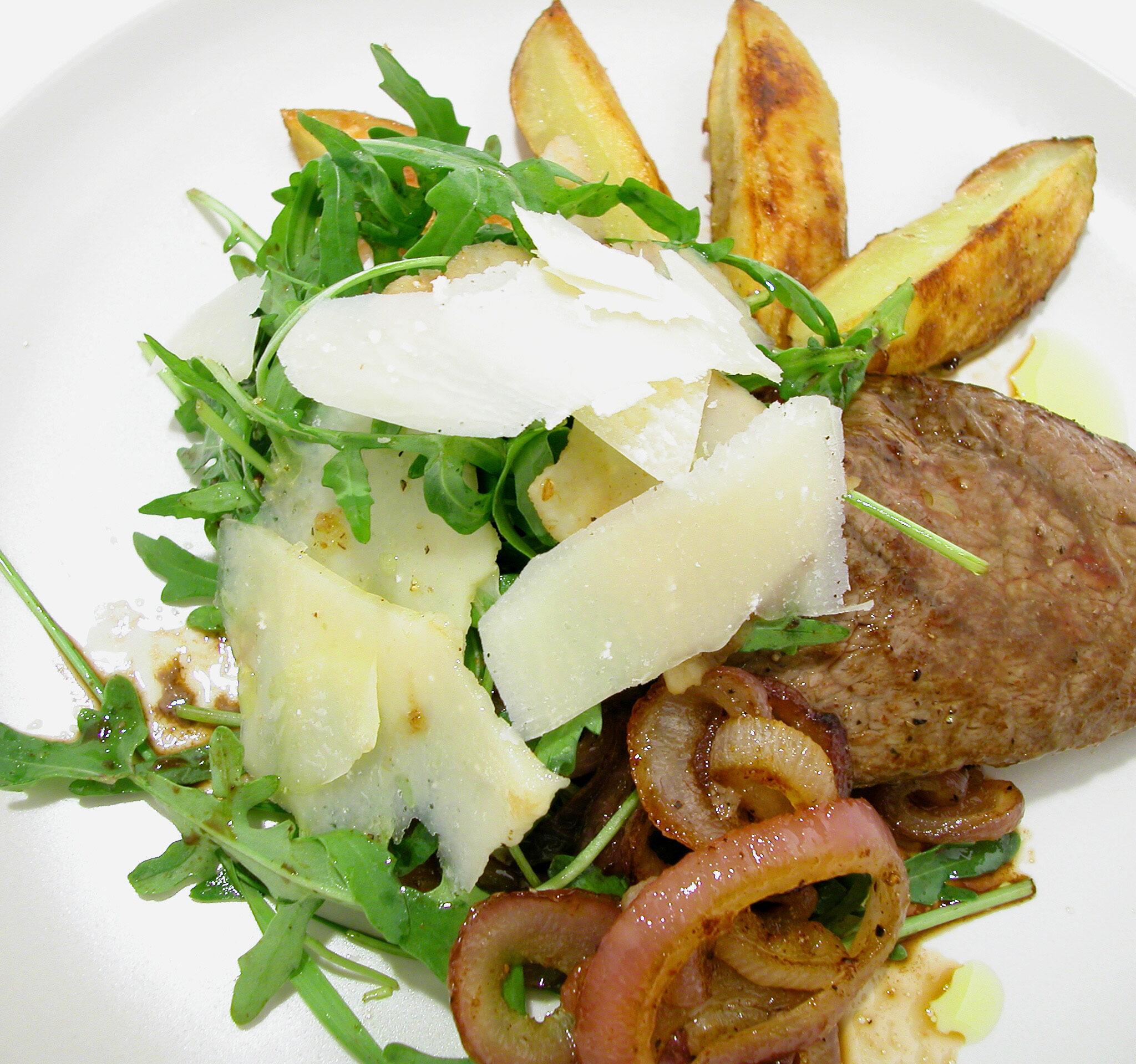 Biffstek med parmesanost och ruccola – Tasteline